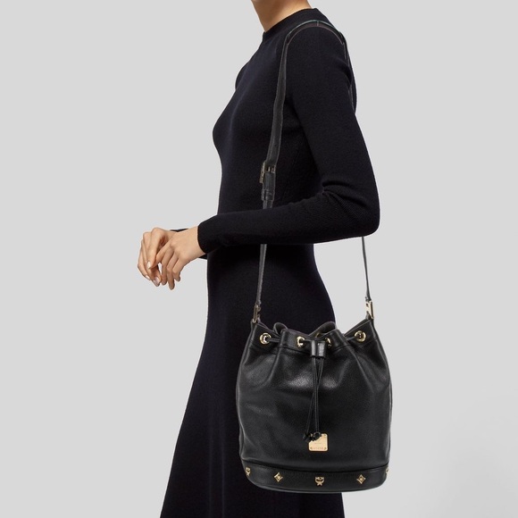 MCM | Bags | Mcm Black Leather Drawstring Bucket Bag Visetos Logo Gold ...